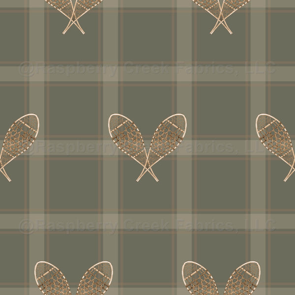 Traditional Babiche snowshoes on green background - Raspberry Creek Fabrics