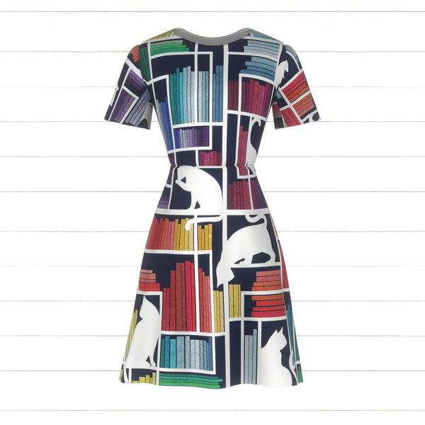 Rainbow bookshelf // navy blue background white book shelves and libra ...