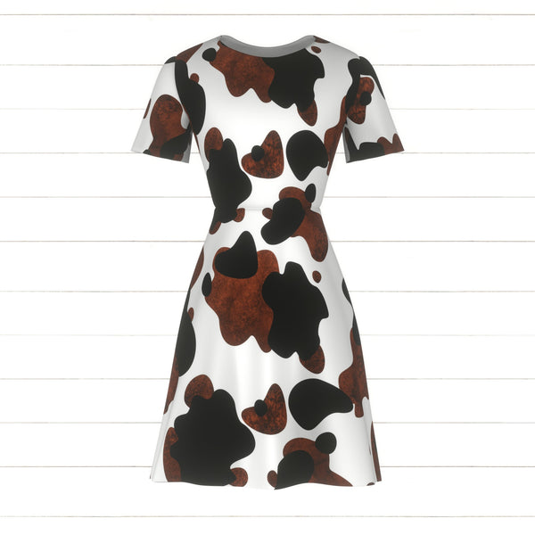 Abstract black, brown and white cow spots pattern - Raspberry Creek Fabrics