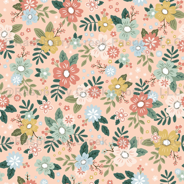 Kinley Blooms | multi colored flowers tossed on a light pink backgroun ...